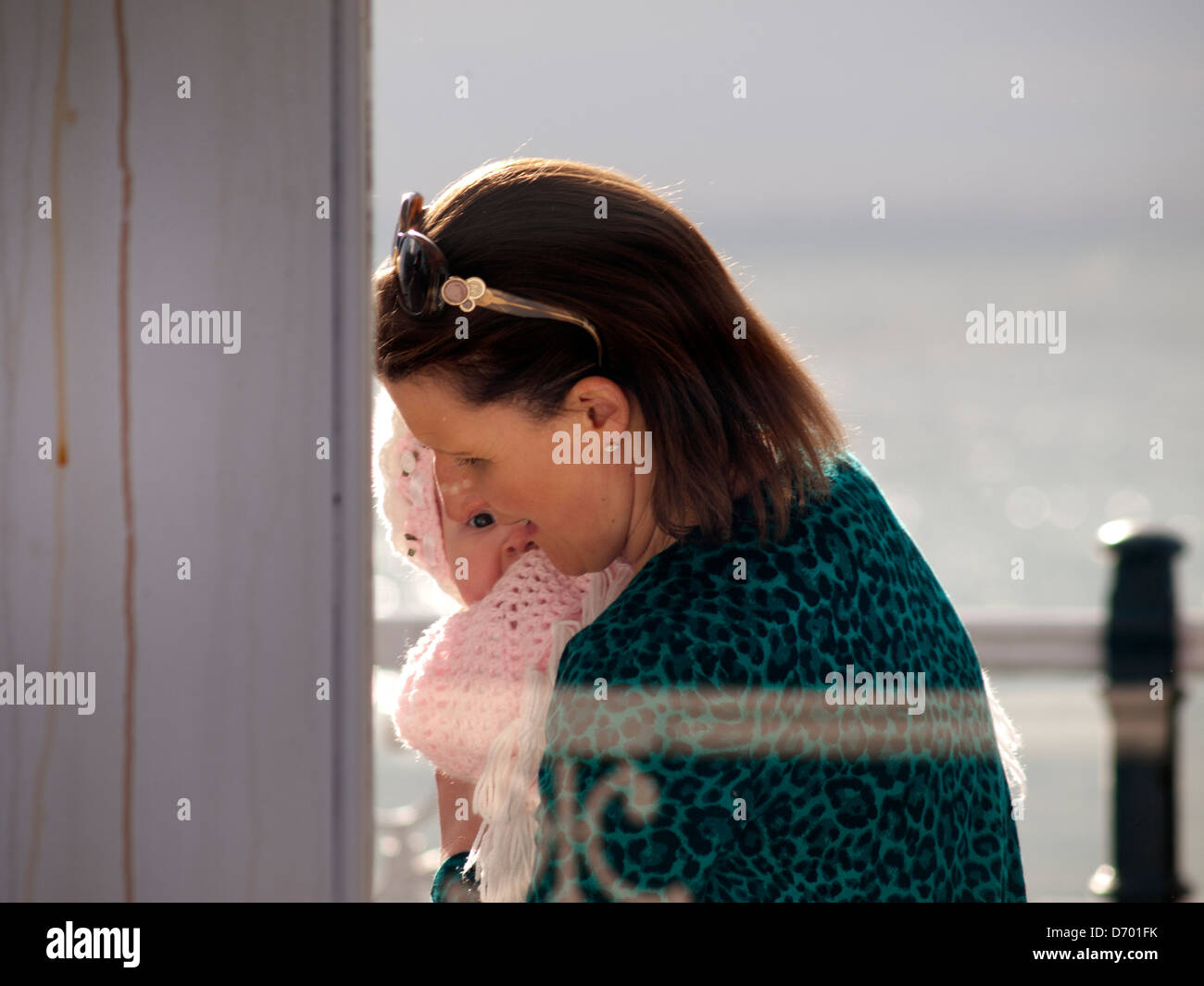 A small baby looks back on Brighton Pier Stock Photo - Alamy