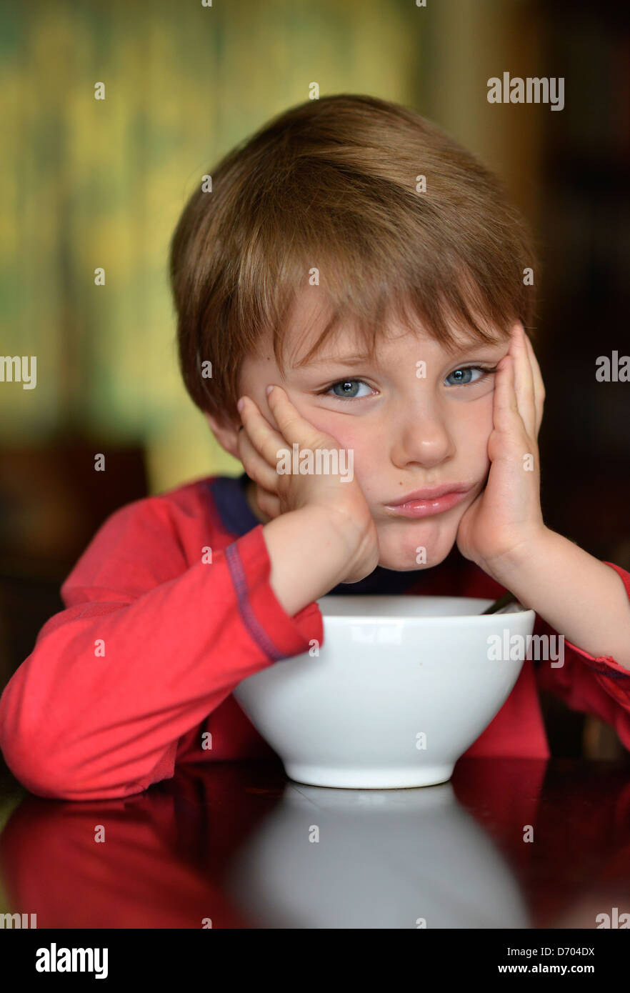 Grumpy boy and dinner hi-res stock photography and images - Alamy