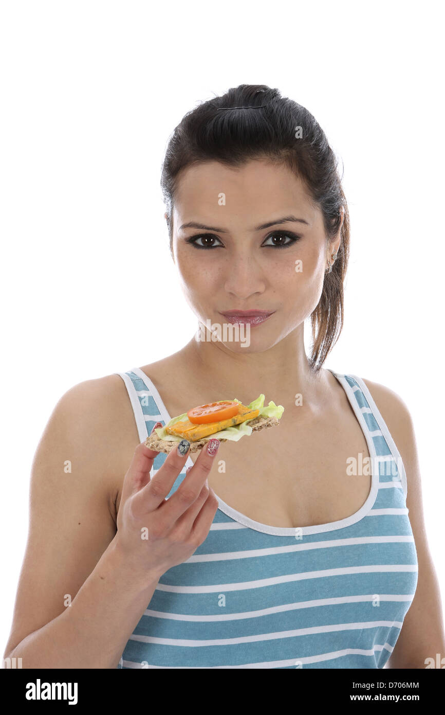 Model Released. Woman Eating Cheese and Cracker Stock Photo - Alamy