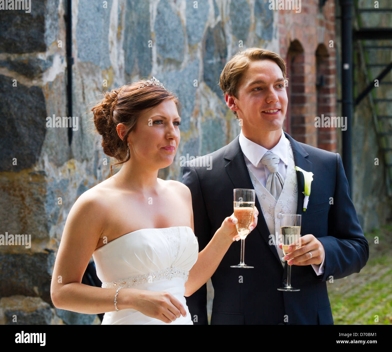 Groom and bride make a toast after the wedding ceremony Stock Photo - Alamy