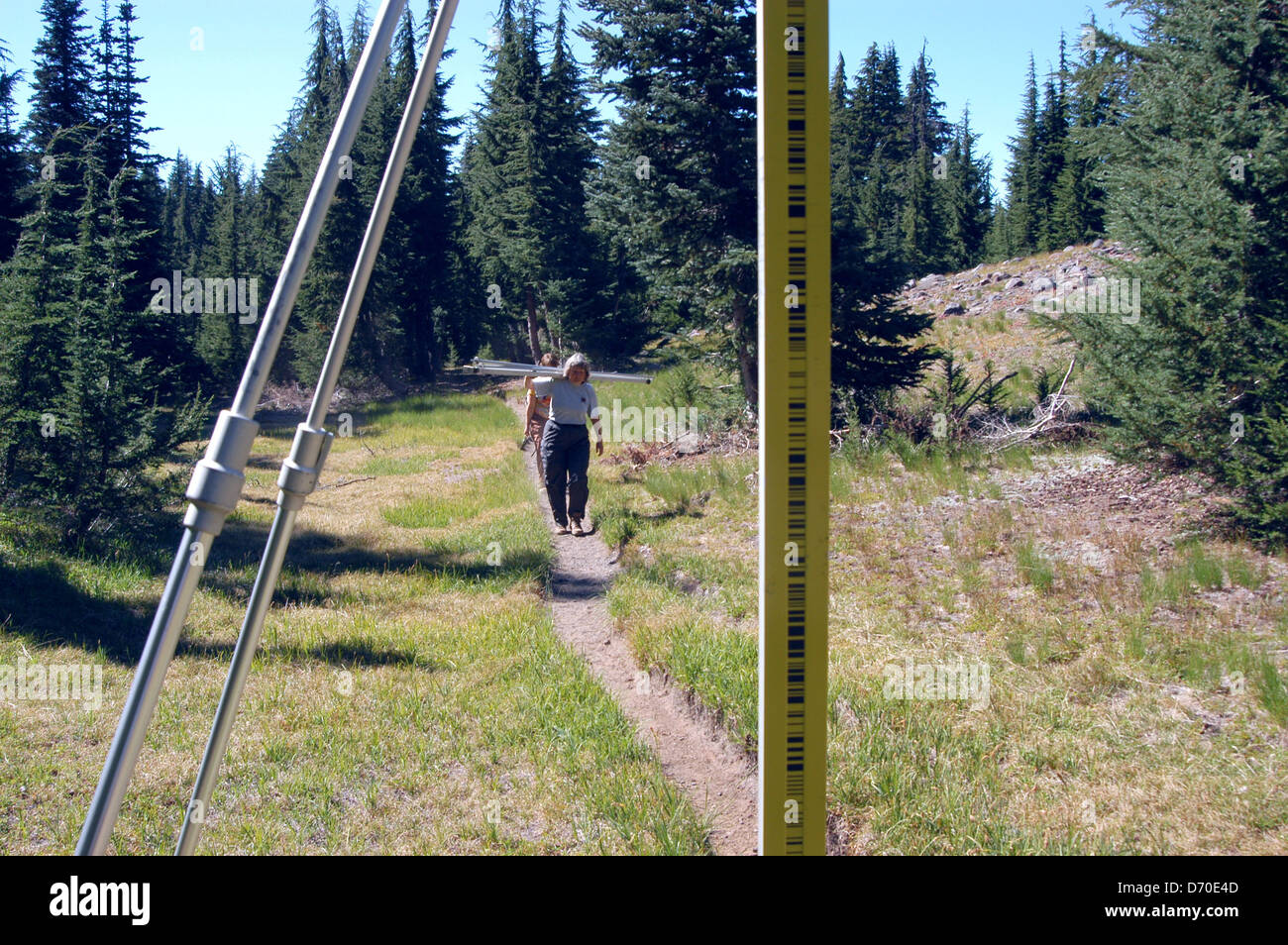 The image shows a United States Geological Survey (USGS) team using ...