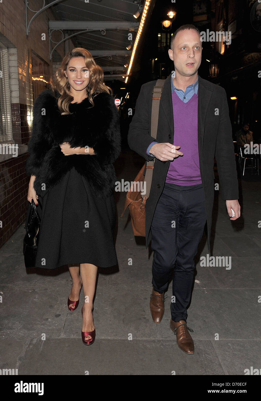 Kelly Brook arriving at J.Sheekey restaurant with a male companion ...