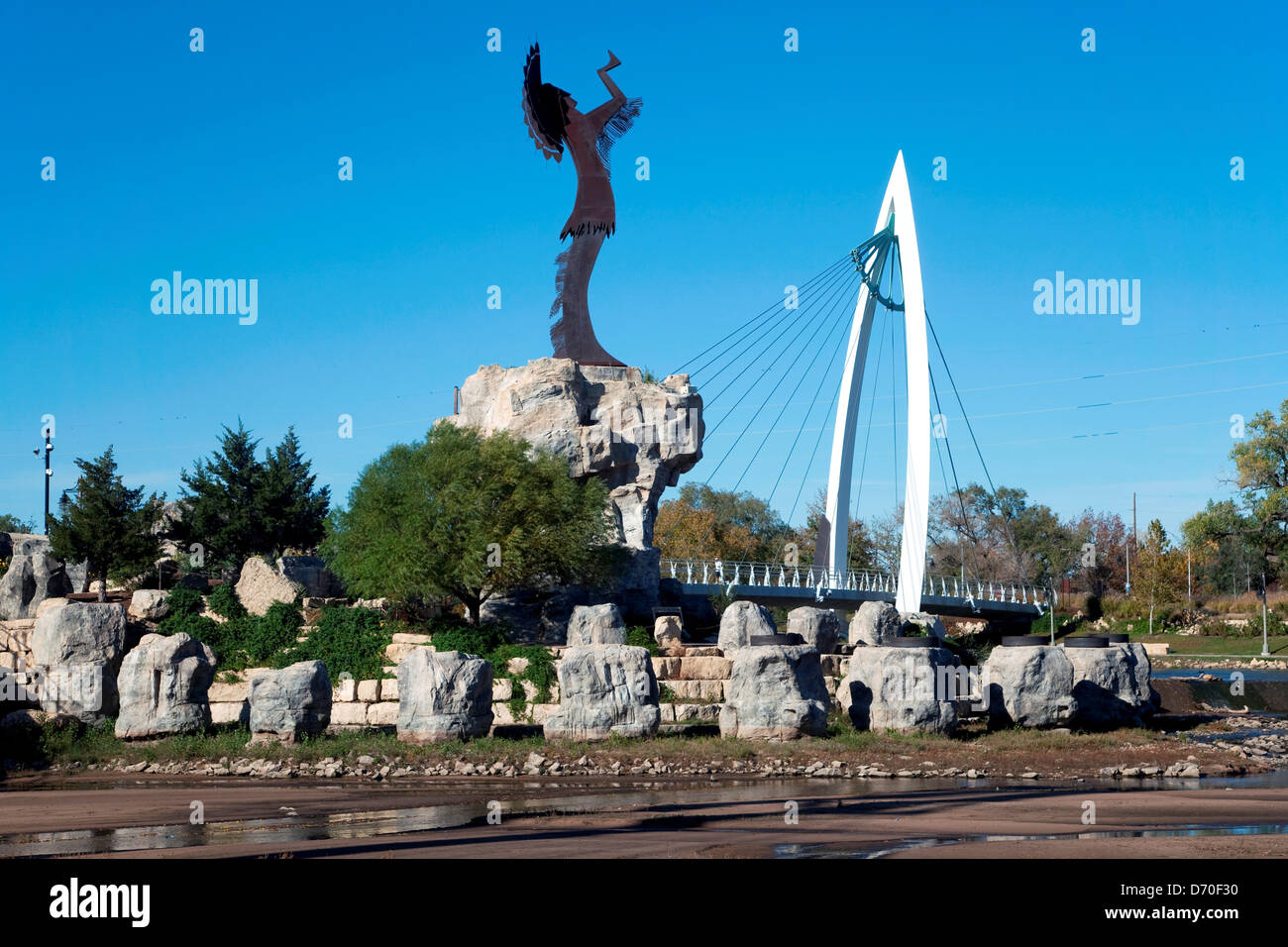 USA, Kansas, Wichita, Keeper of Plains sculpture and Arkansas River ...