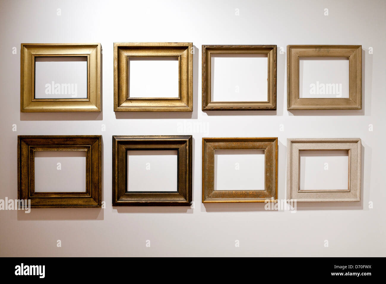 Empty picture frames on white wall Stock Photo - Alamy