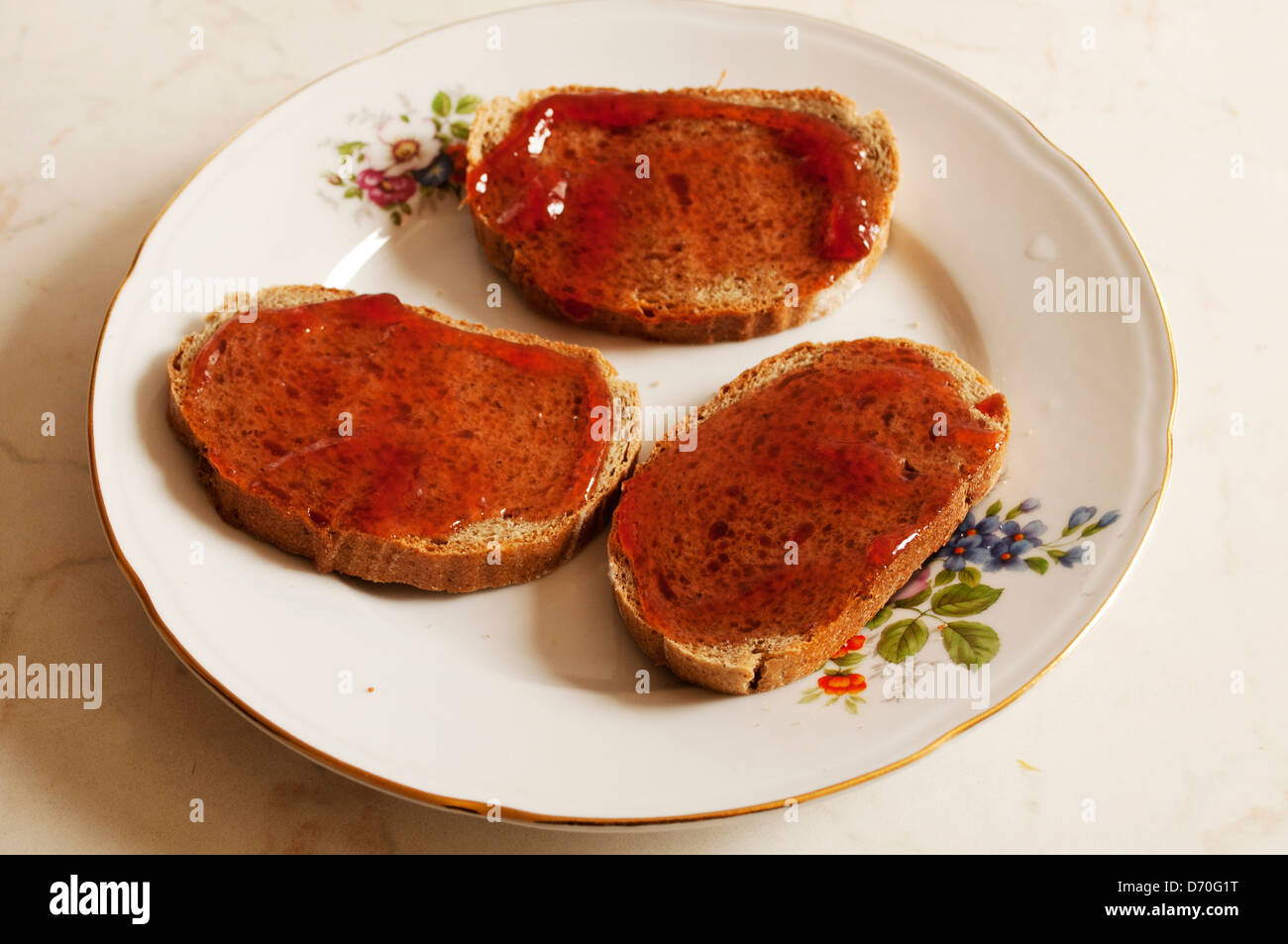 Jam on bread Stock Photo - Alamy