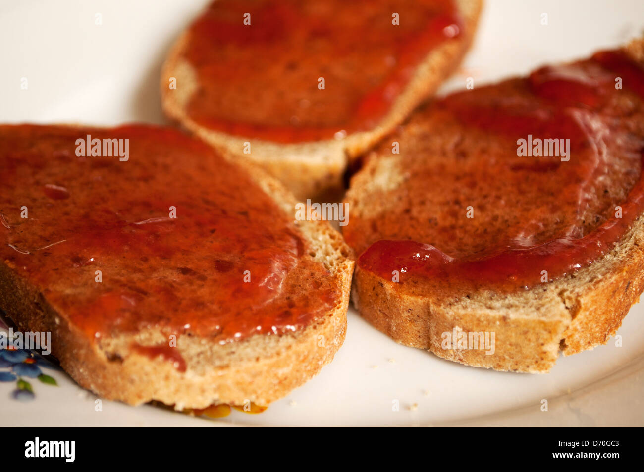 Jam on bread Stock Photo - Alamy