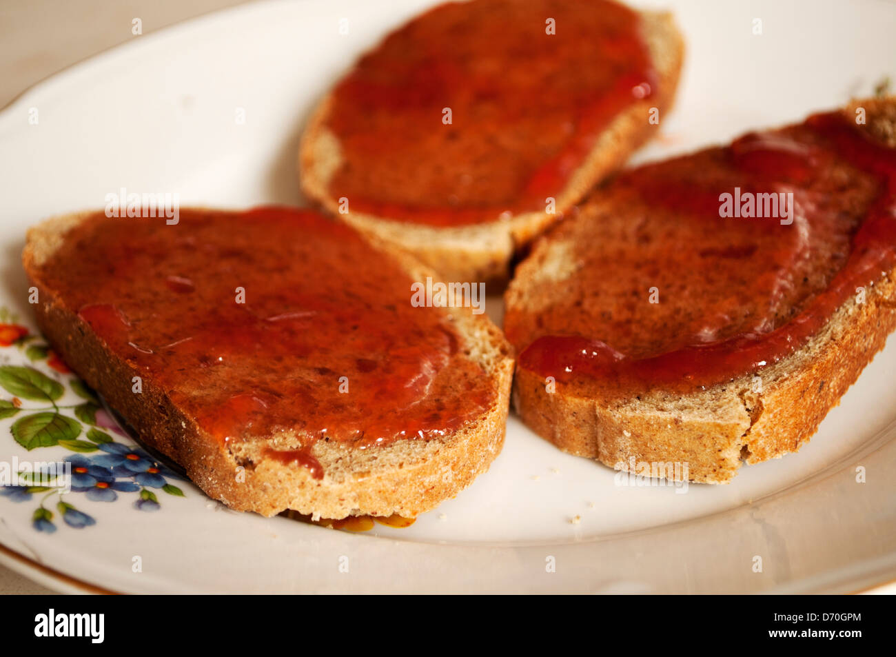 Jam on bread Stock Photo - Alamy