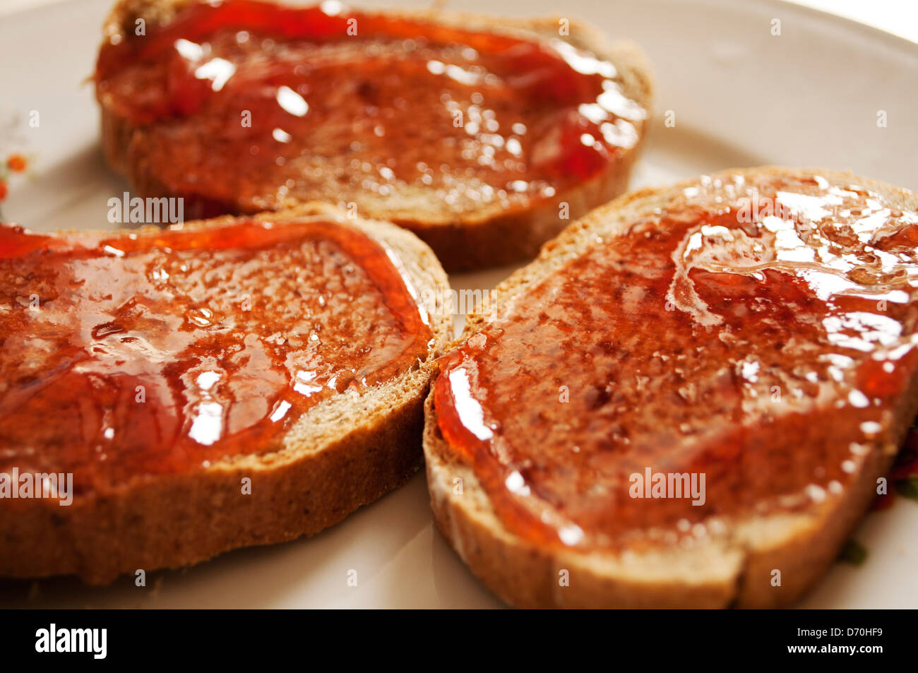 Jam on bread Stock Photo - Alamy