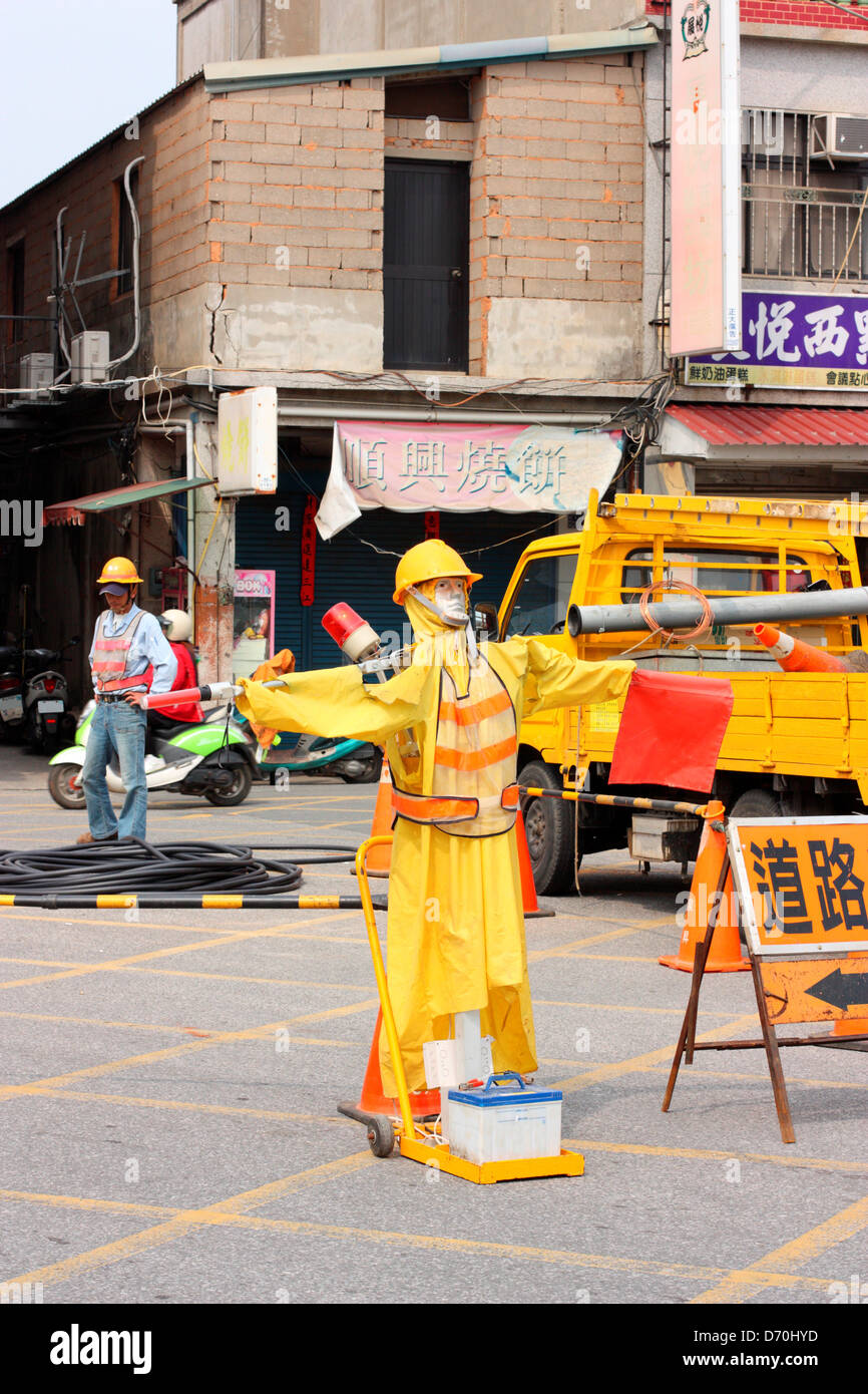 Taiwan, Kinmen County, Jincheng, Road workers and mannequin Stock Photo ...