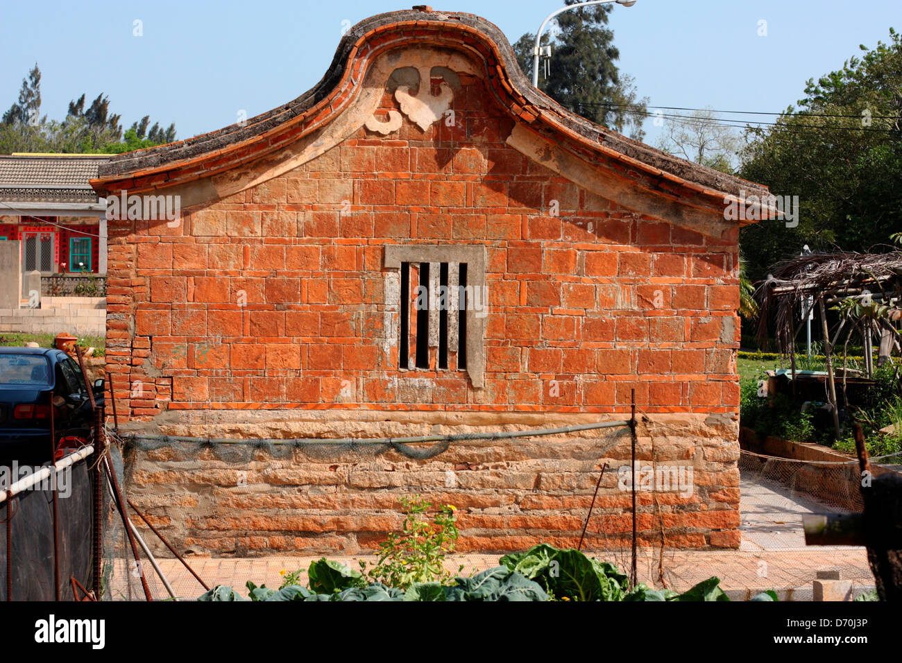 Taiwan, Kinmen County, Shuitou Village, Old saddleback style house ...