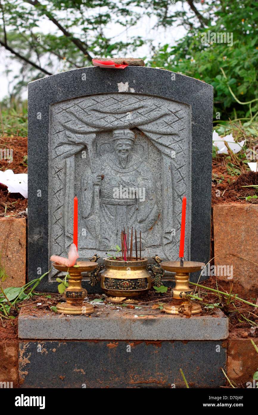 Taiwan, Kinmen County, Kinmen National Park, Overgrown altar, grave ...