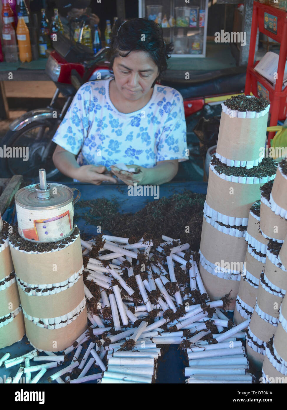 Lady rolling hand made tobacco cigarettes in Iquitos, Peru Stock Photo ... Lady rolling hand made tobacco cigarettes in Iquitos, Peru Stock Photo ...