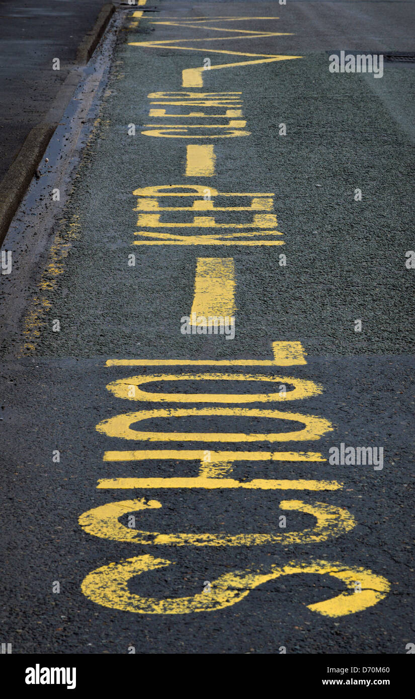School keep clear road safety markings outside a school entrance Stock ...