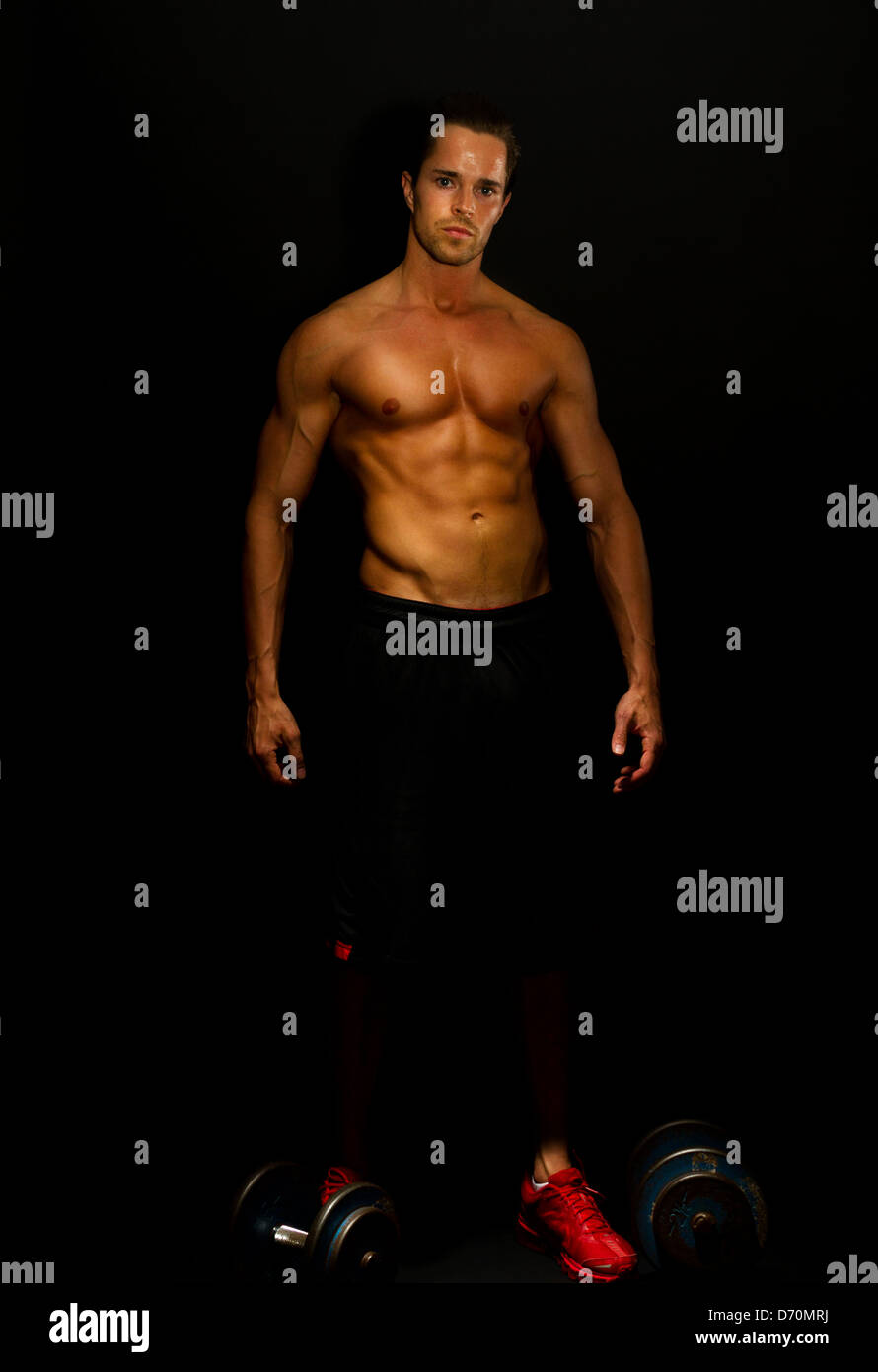 Handsome muscular fit young man hi-res stock photography and images - Alamy