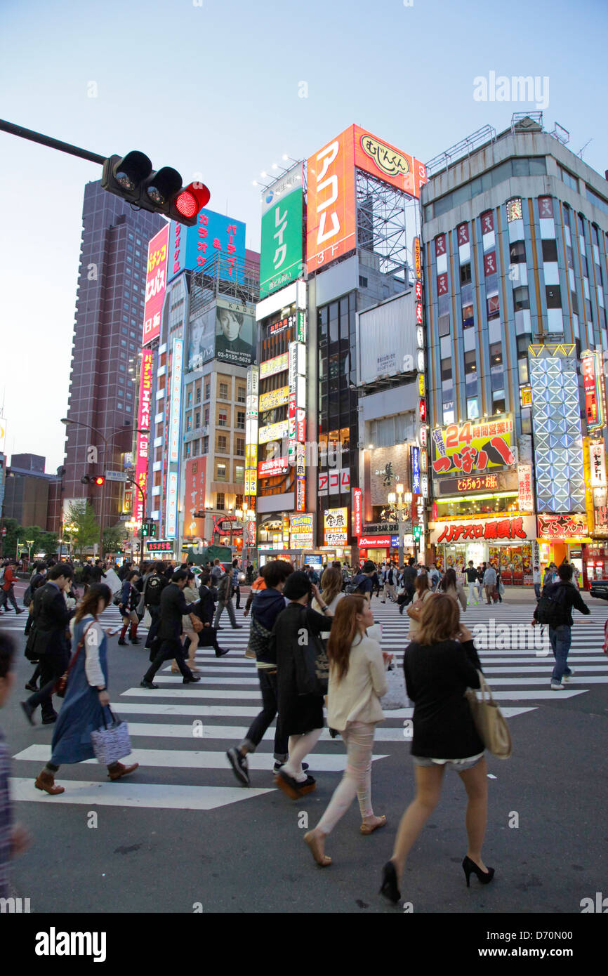 People crossing a road entrance of Kabukicho an entertainment district ...