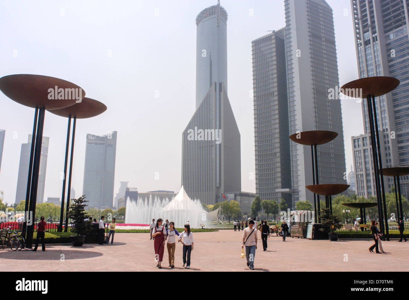 People walk through the Pudong financial area of Shanghai, China Stock ...