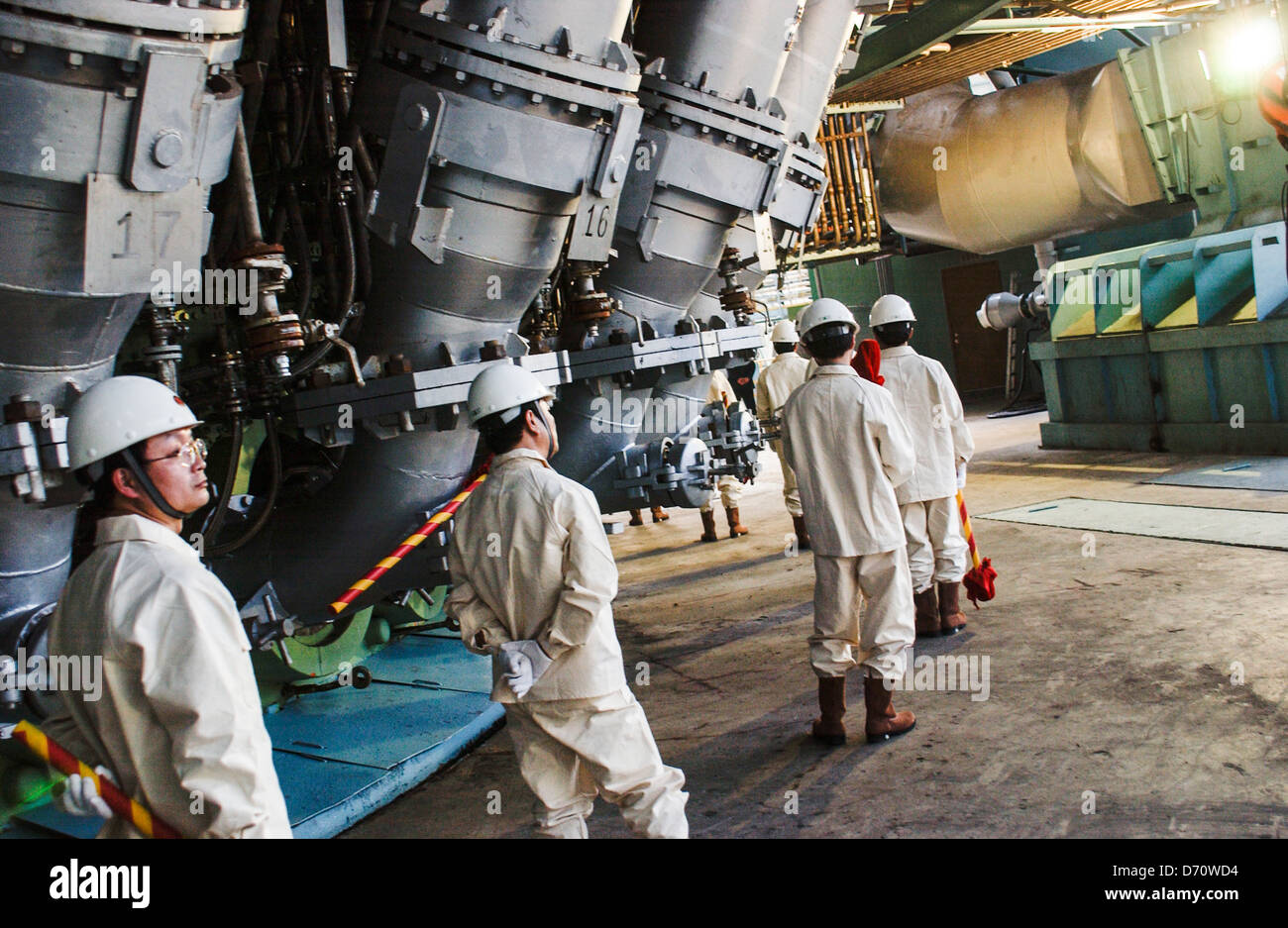 Workers at the opening of the #4 blast furnace at the Baosteel ...