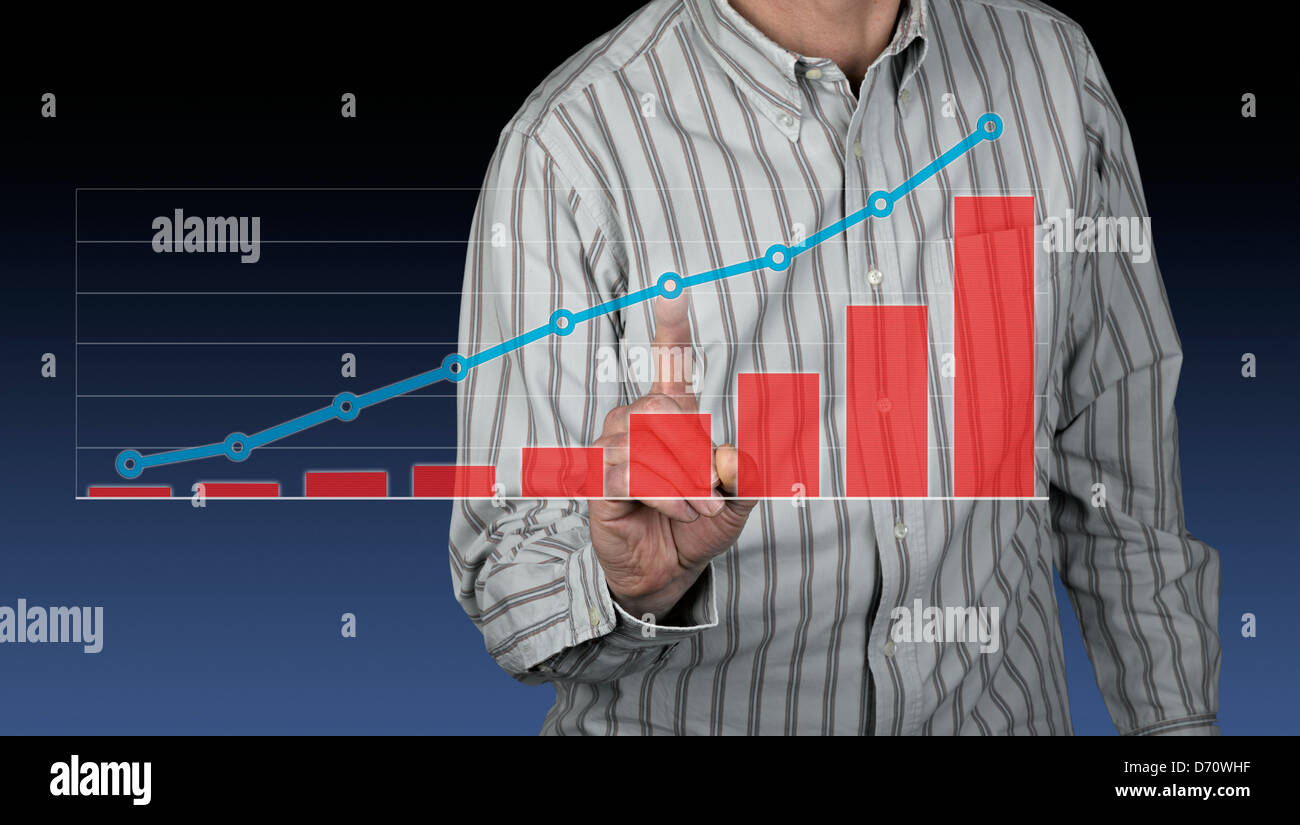 Business men hand pushing write graph Stock Photo - Alamy