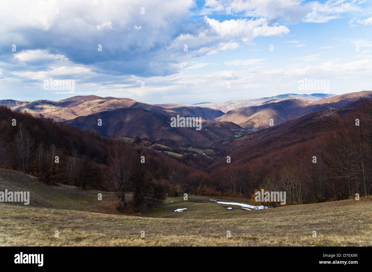Early spring sunlight and shadows on a hills Stock Photo - Alamy