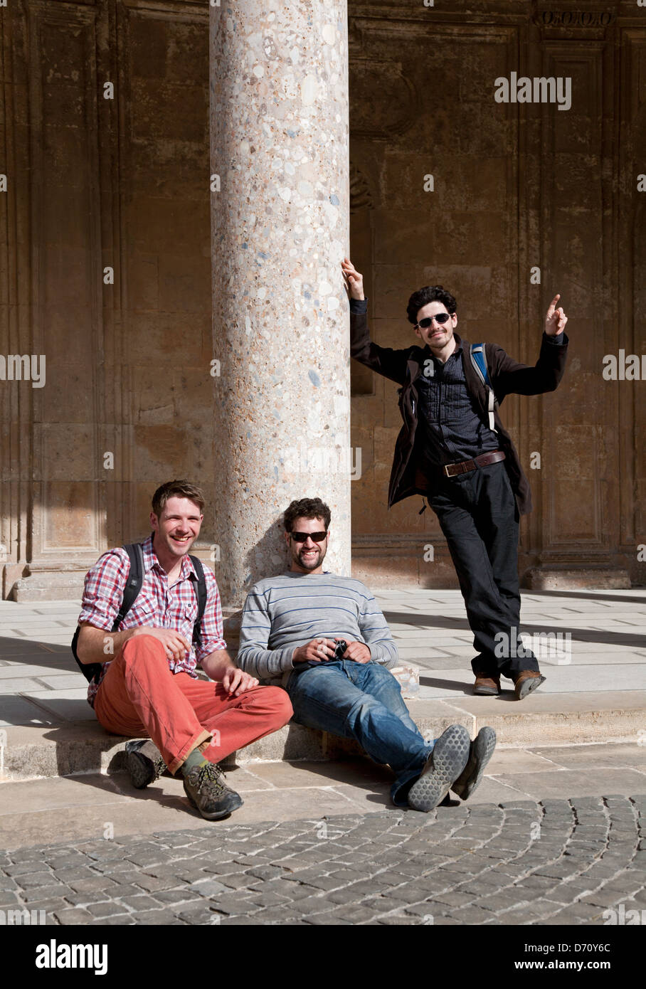 Three male British friends enjoying a visit at the Alhambra in Granada ...