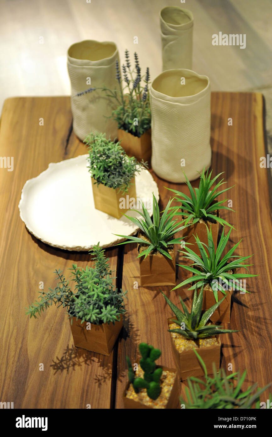 Interior; design; designer; flowers; fruits; wood shelves; books ...