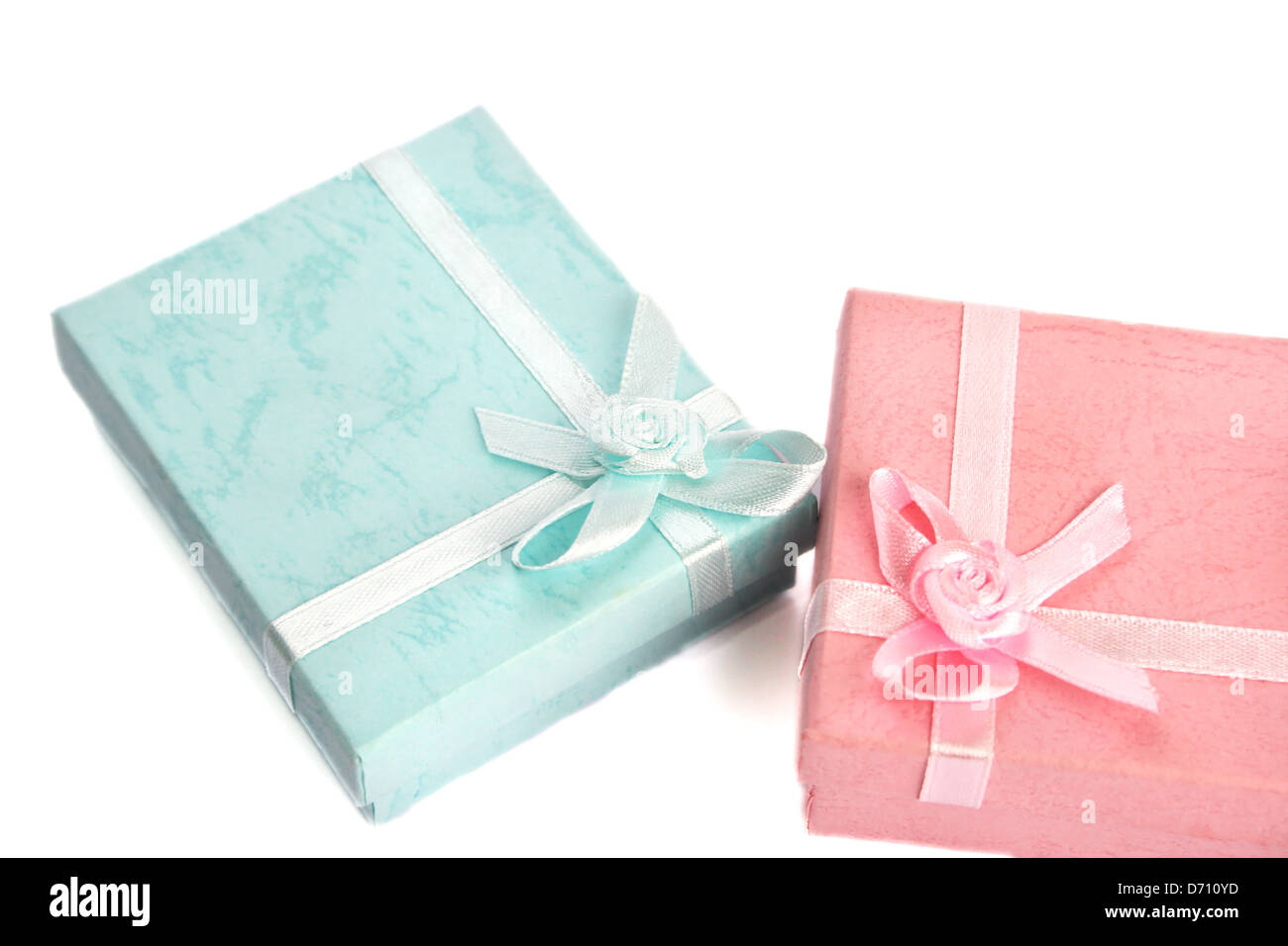 Pink and blue boxes isolated on white background Stock Photo - Alamy