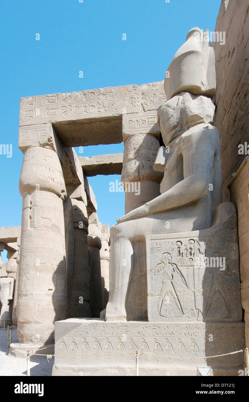 Statue of Ramses II with his daughter Meritamen, Karnak Temple Complex ...