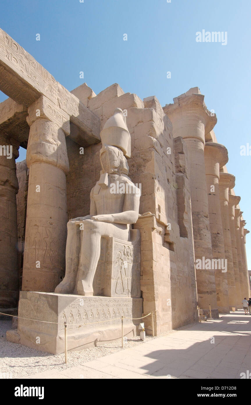 Statue of Ramses II with his daughter Meritamen, Karnak Temple Complex ...