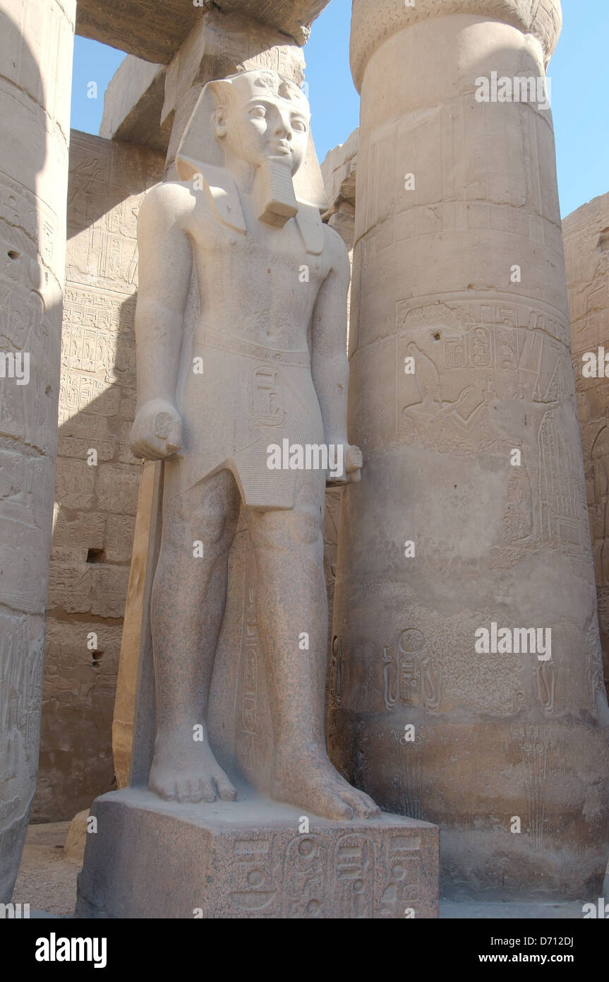 Statue of Ramses II with his daughter Meritamen, Karnak Temple Complex ...