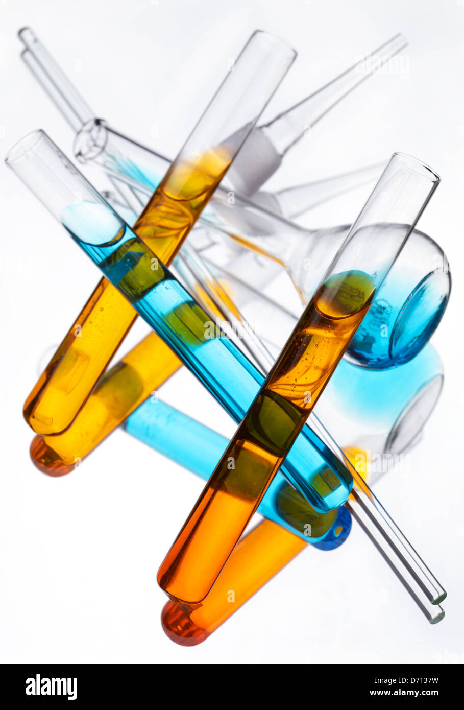 test tubes and bulb with colored liquid on a white background Stock ...