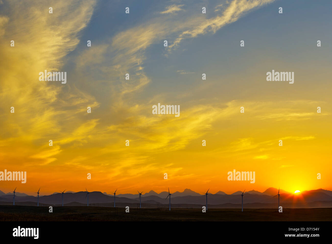 Canada, Alberta, Sunset over landscape with wind turbines Stock Photo ...