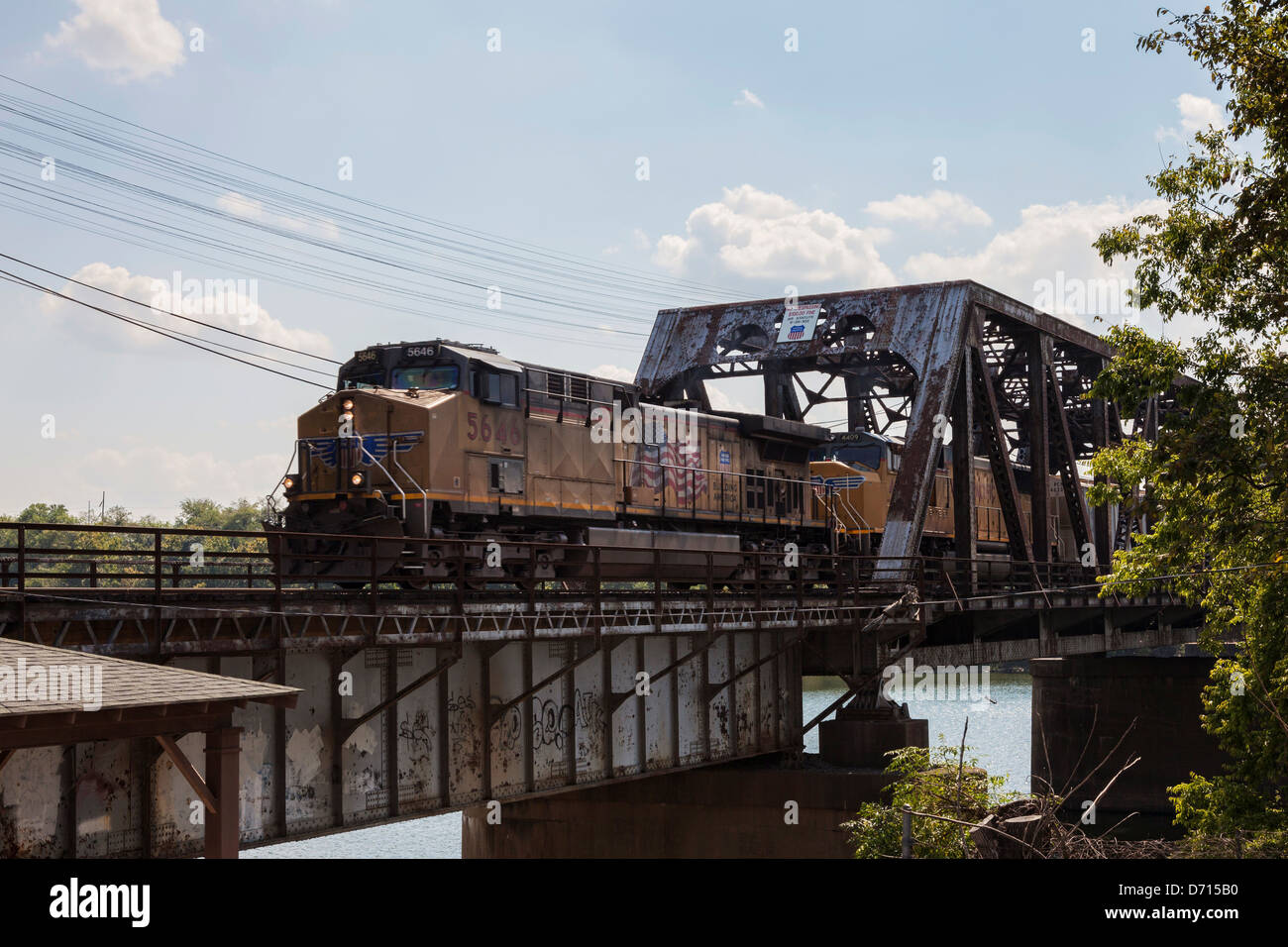 USA, Arkansas, North Little Rock, Train on train trestle, crossing ...