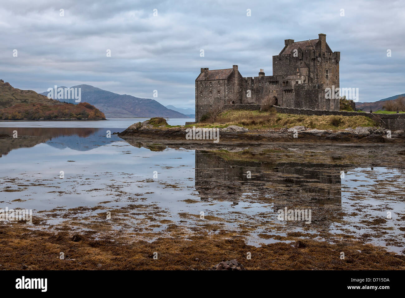 Reflection of a castle on water, Eilean Donan Castle, Loch Alsh, Dornie ...