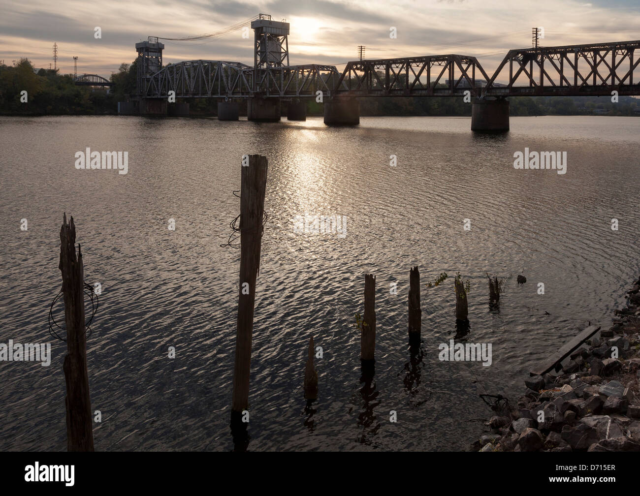 Railroad trestle bridge crossing Arkansas River at dusk, North Little ...