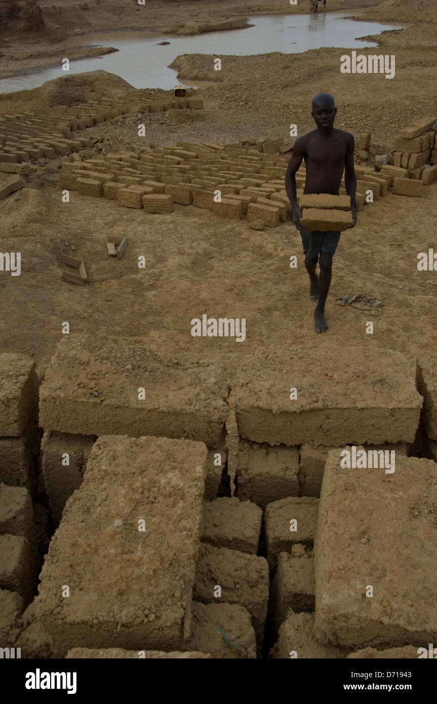 Mali, Bandiagara, Mud Brick Production, Bricks Being Stacked Stock ...