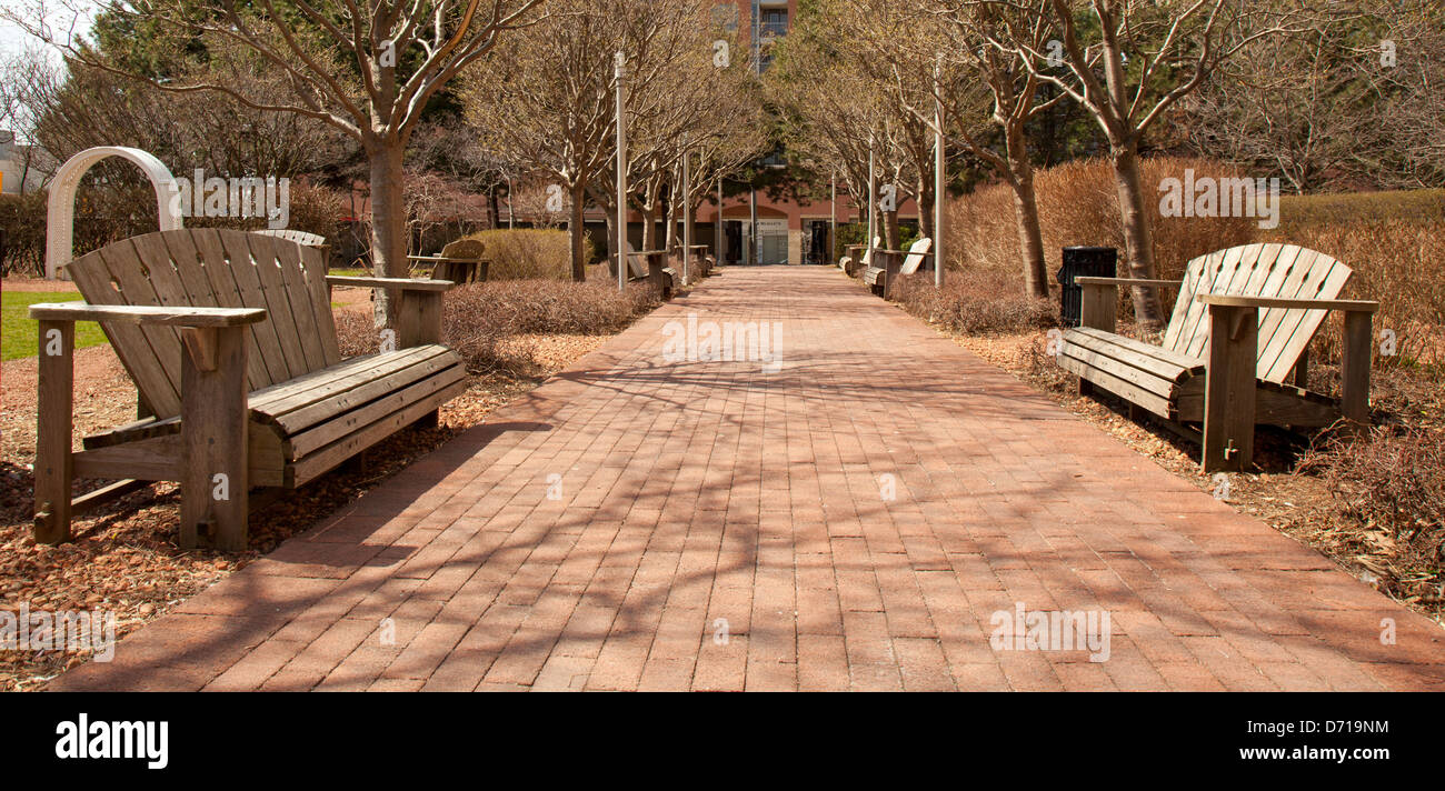 park benches along walking path Stock Photo - Alamy