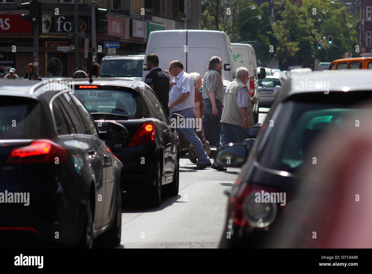Berlin, Germany, pedestrians cross the Karl-Marx-Strasse Stock Photo ...