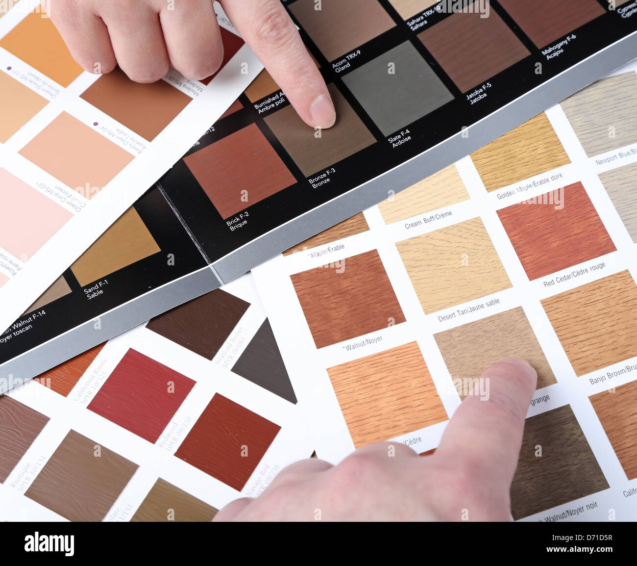 Hands pointing to sample color chart Stock Photo - Alamy