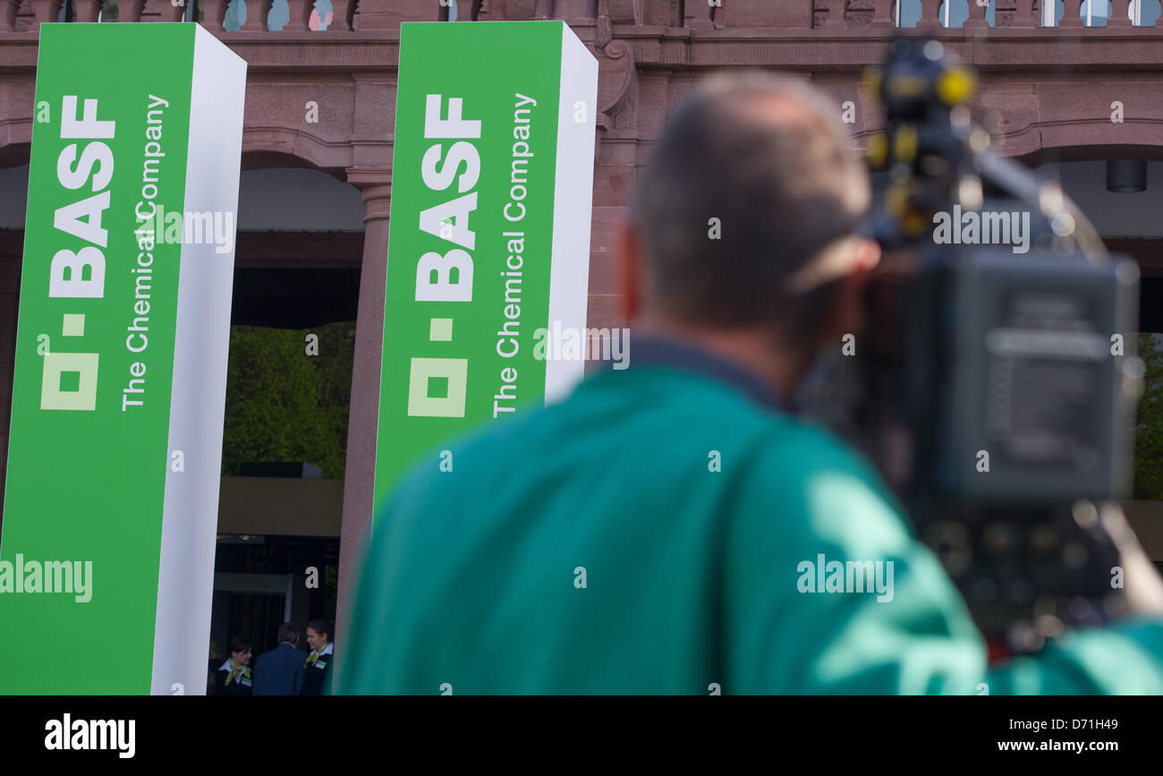 A camera man films the logo of chemical company BASF, prior to the ...