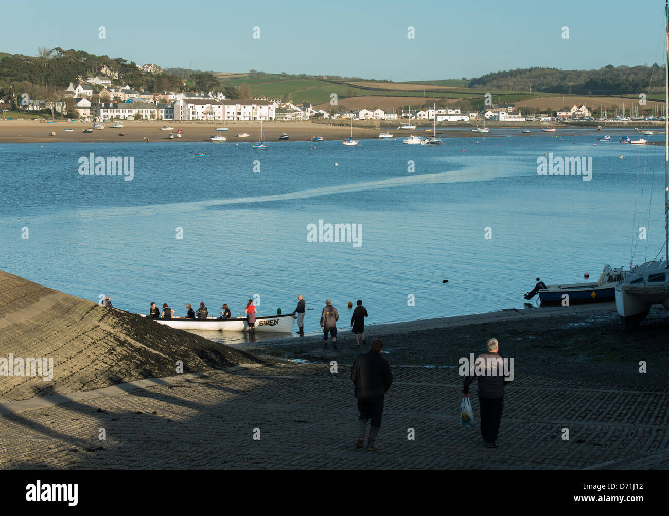 Appledore, North Devon, England. A rowing team is embarking from ...