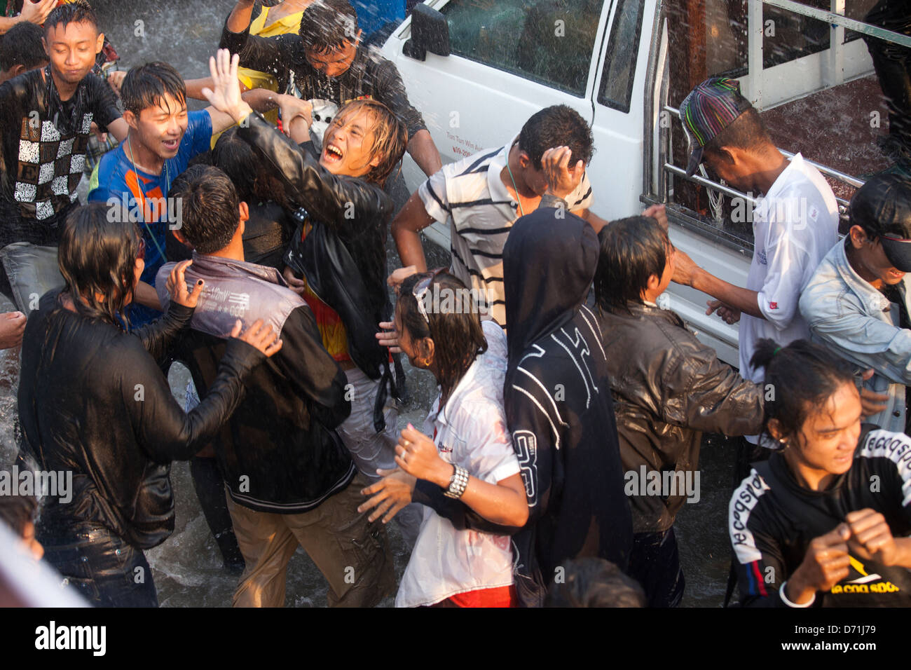 Young people jumped off their vehicles to dance and get hosed with ...