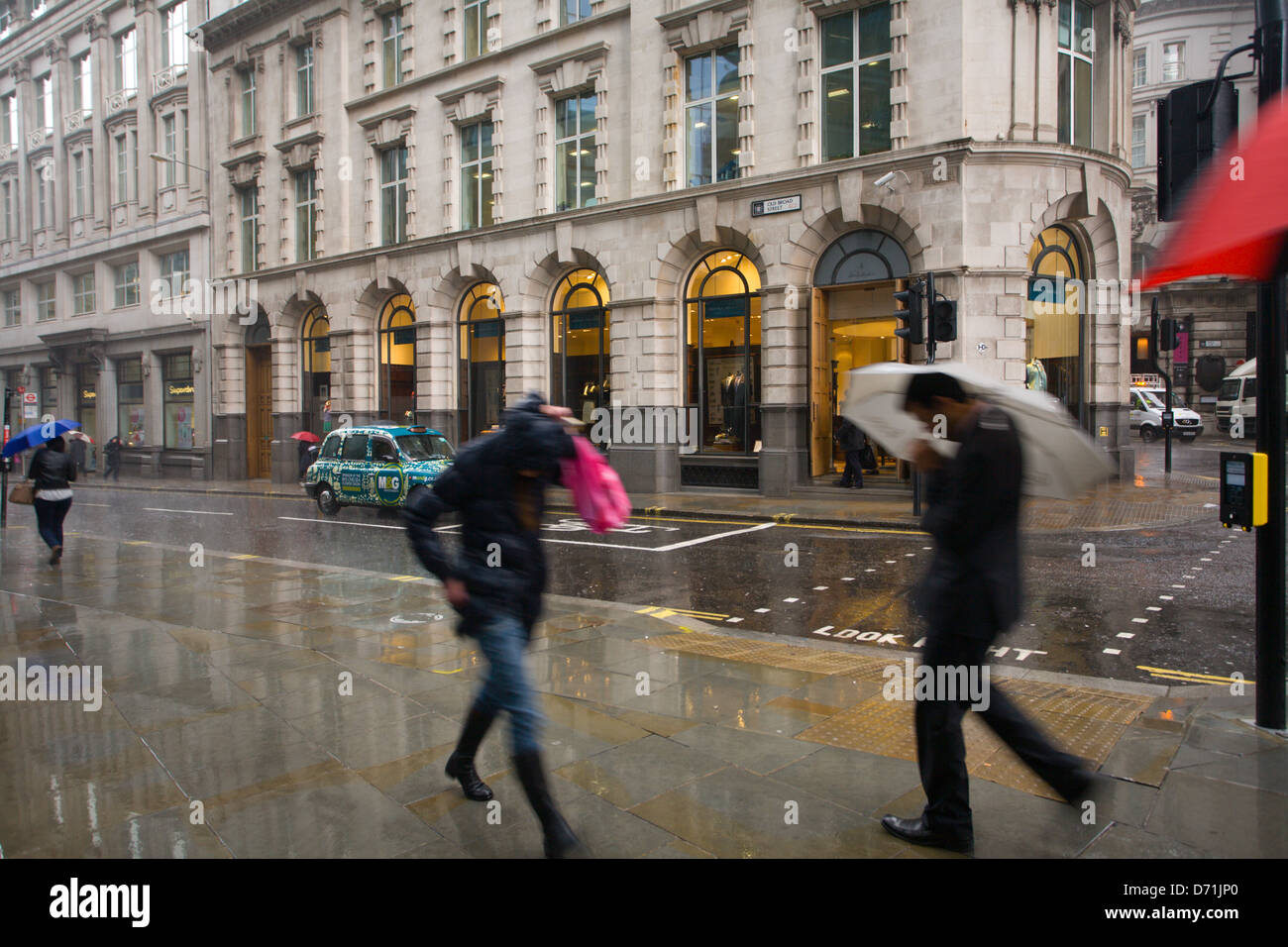 People running through the rain, old broad street, London Stock Photo ...