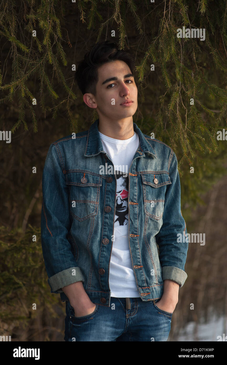 Young fashionable guy posing outside Stock Photo - Alamy