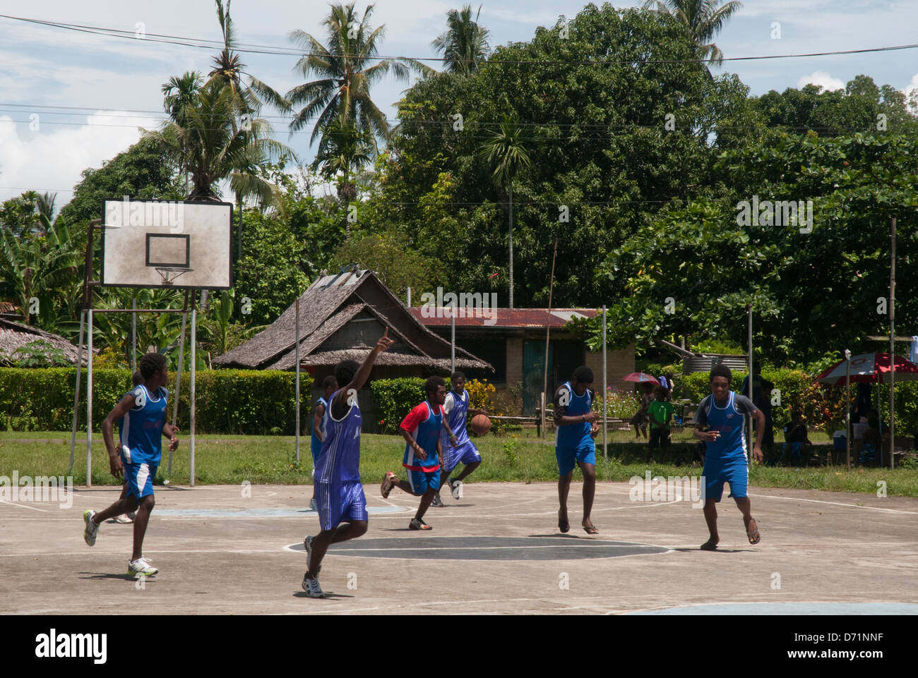 Young men of Papua New Guinea playing basketball in the provincial town ...