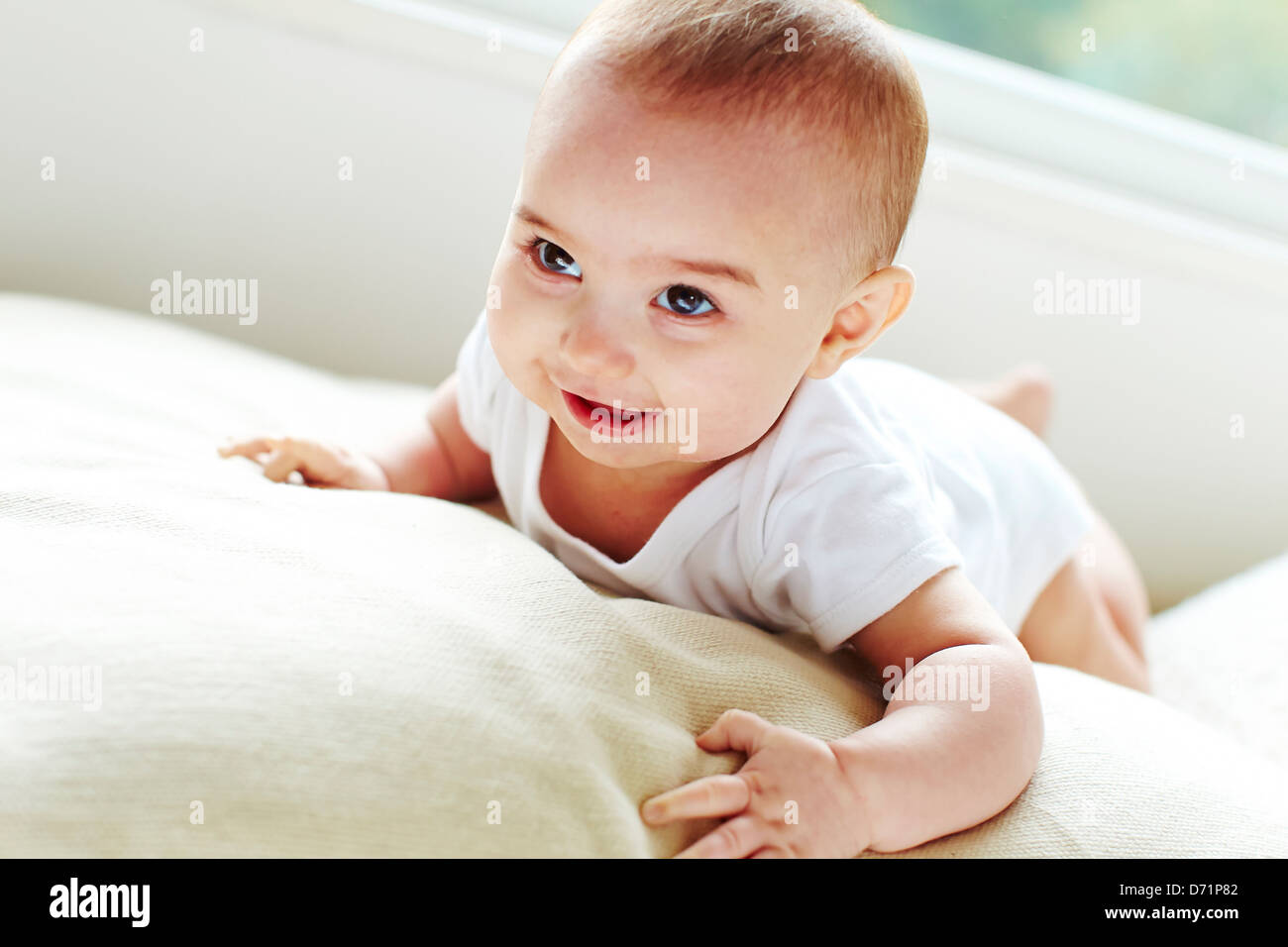 Baby laid on front hi-res stock photography and images - Alamy