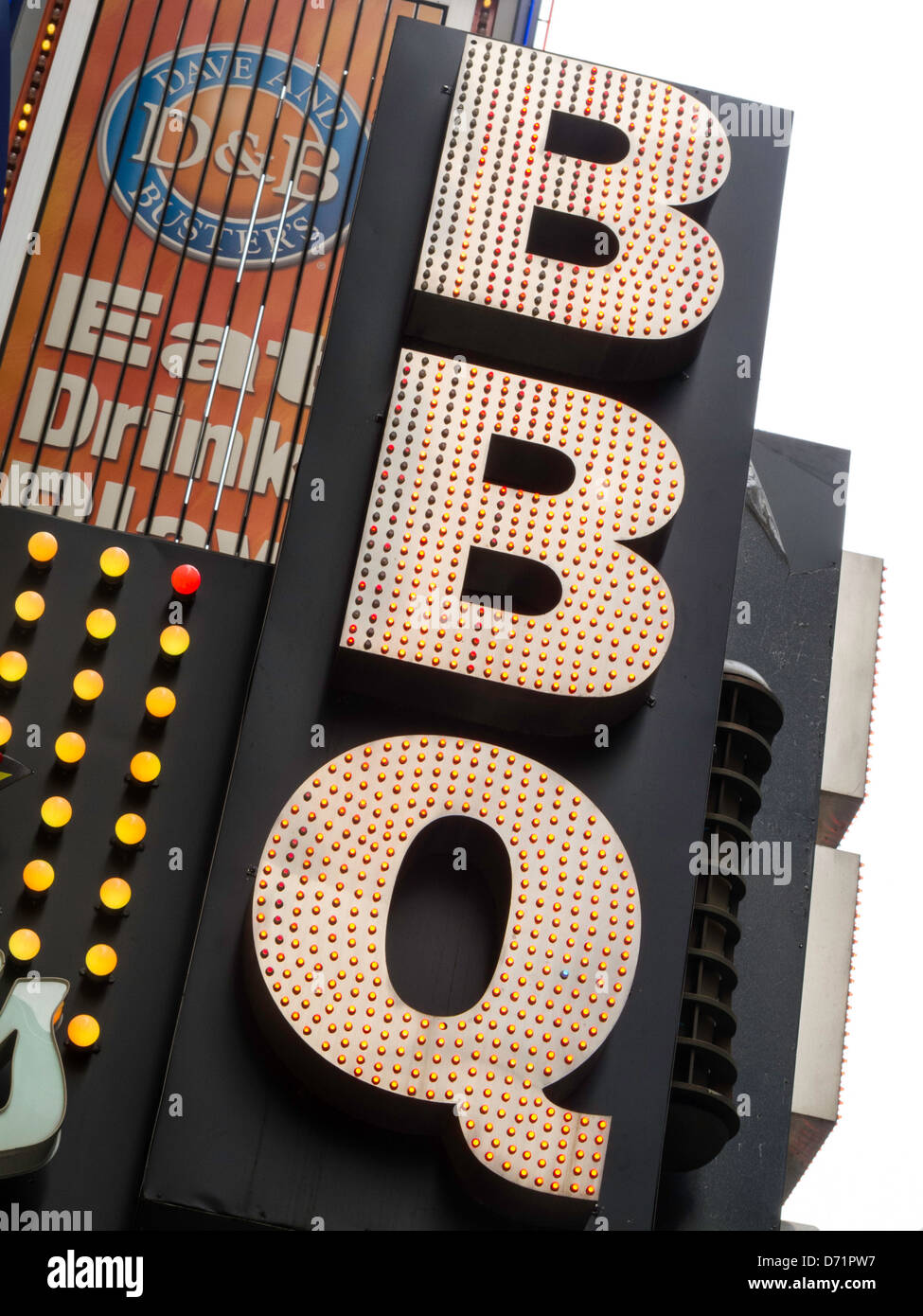 BBQ Restaurant Lighted Sign, Times Square, NYC Stock Photo - Alamy