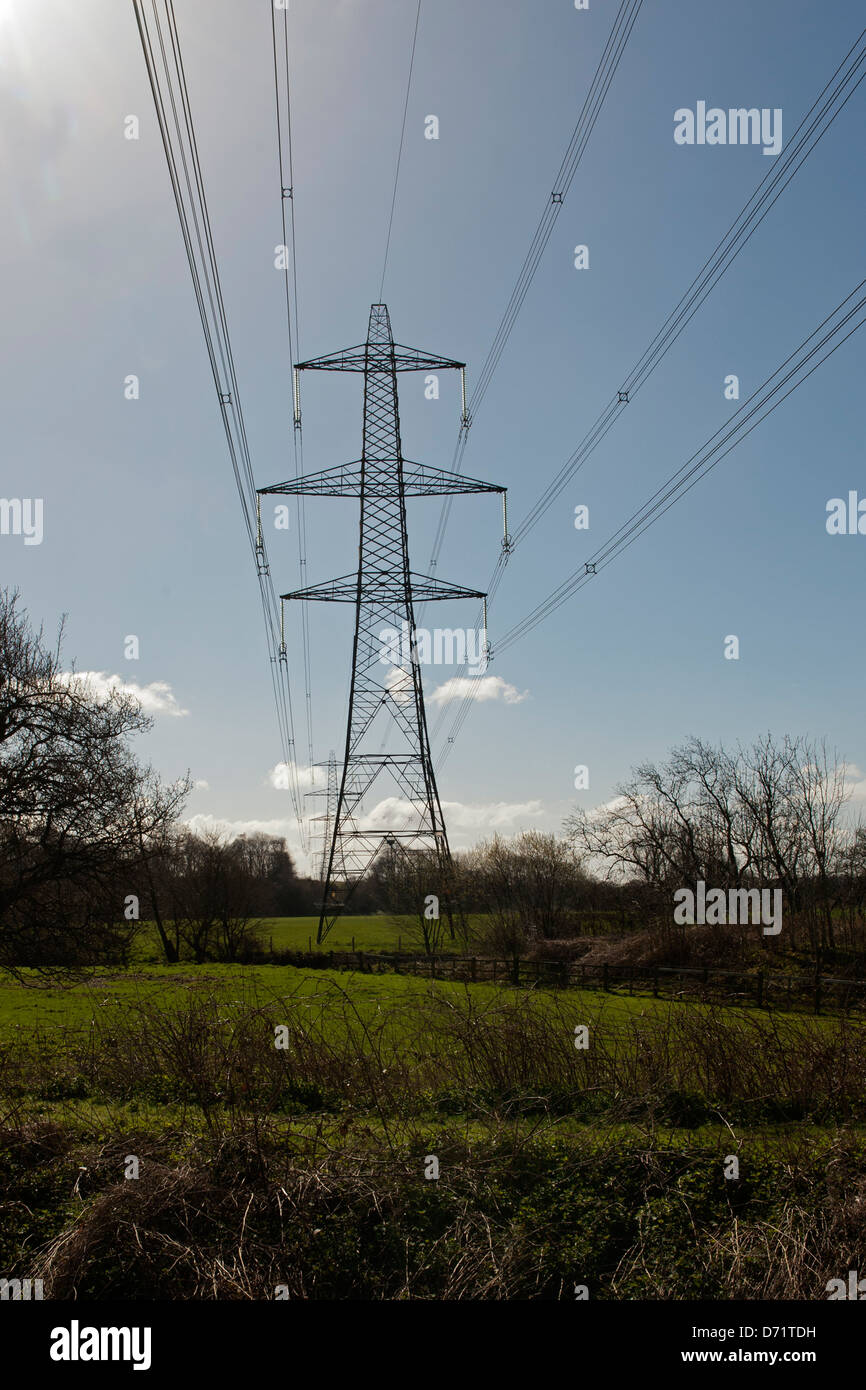 High voltage power lines in the English countryside Stock Photo - Alamy