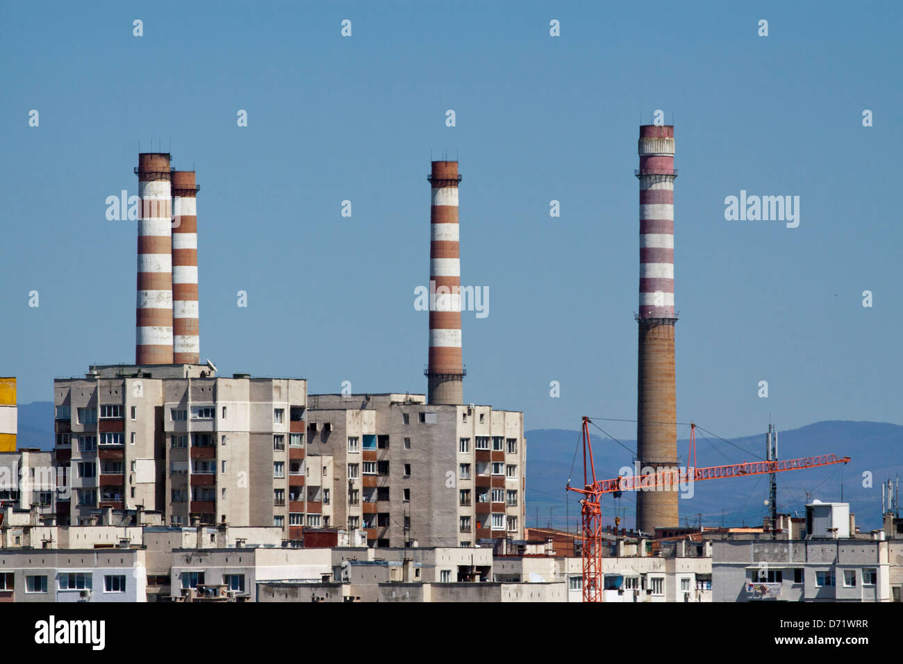 Smoke stacks of Sofia Iztok thermal power plant behind the apartment ...