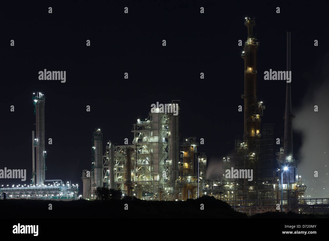 Night View of an Oil Refinery Plant. Horizontal shot Stock Photo - Alamy