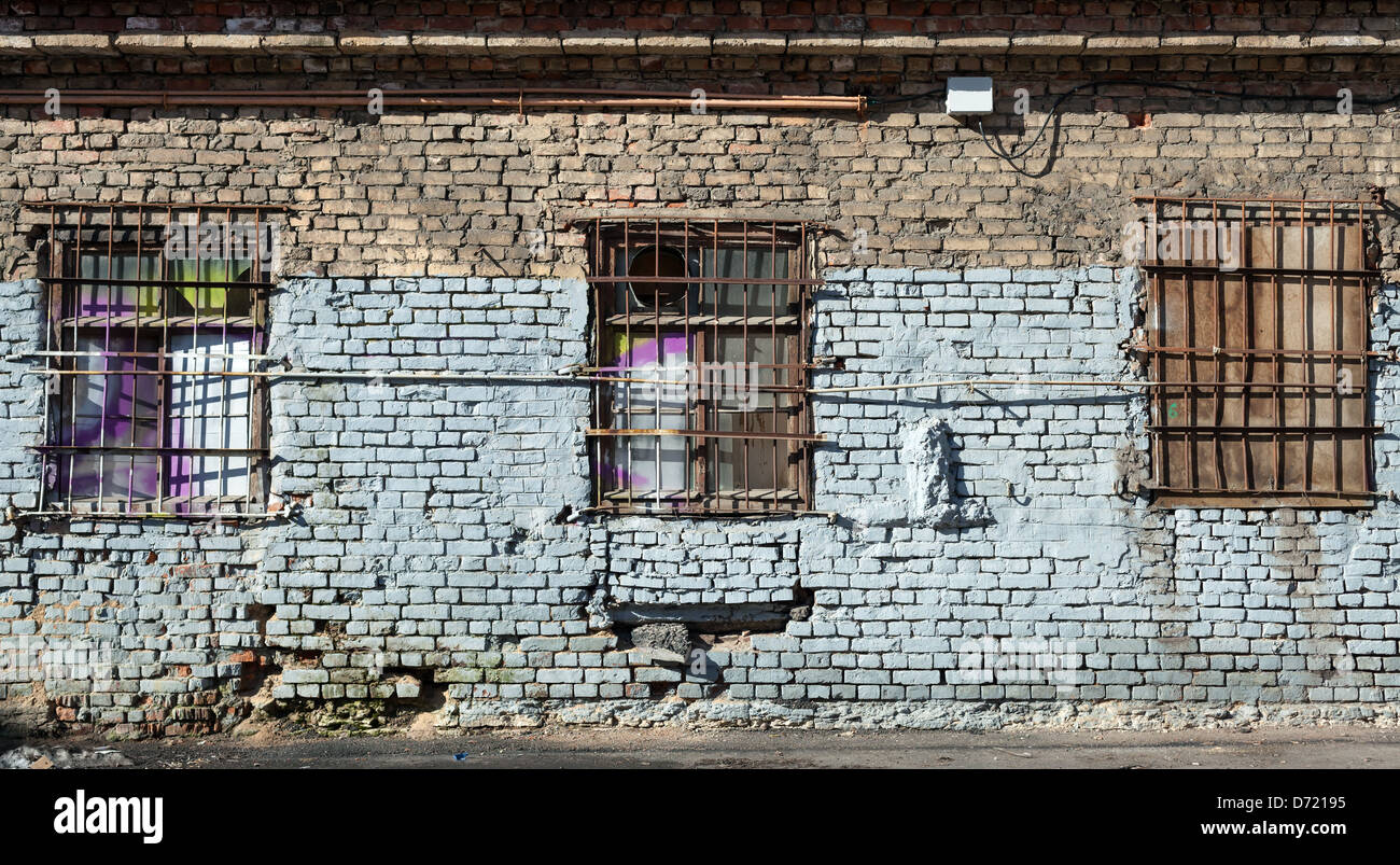 Old abandoned building wall texture with locked windows Stock Photo - Alamy